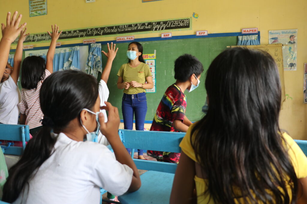 Volunteer teacher finds fulfillment in seeing students cope with learning